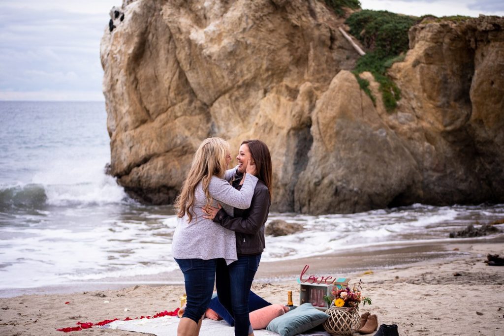 Cliffside fall El Matador Beach proposal with romantic picnic