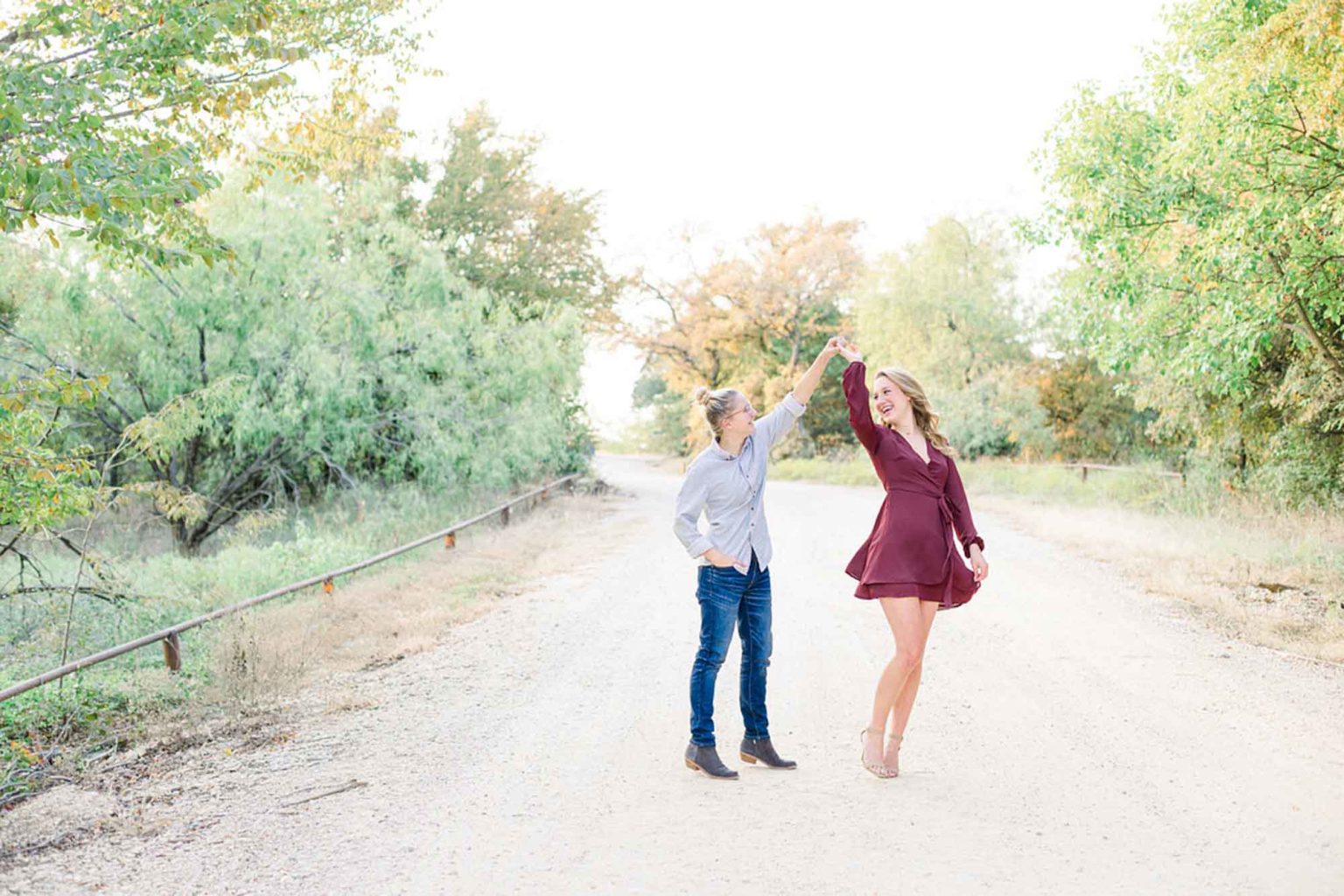 Autumn engagement session in Texas with joyful photos in the lake