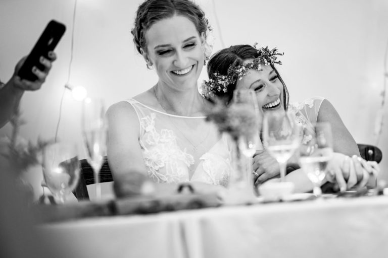 Outdoor Colorado wedding at historic cottage with triangle arch
