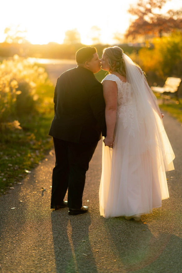 These rugby brides tied the knot after one bride’s wedding party huddle