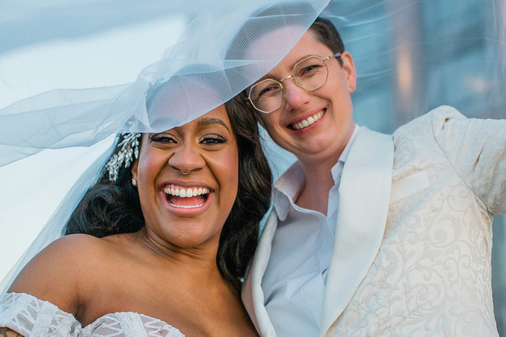 These two brides celebrated their summer wedding with a champagne tower ...